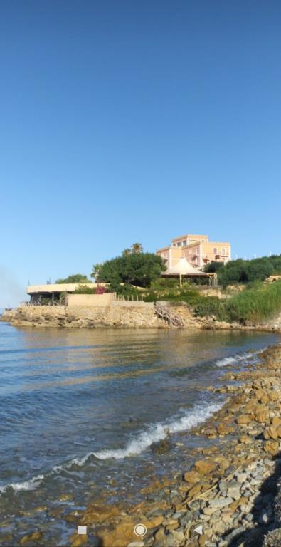 Villetta in villaggio turistico sul mare - Casa Vacanza a Isola di Capo ...